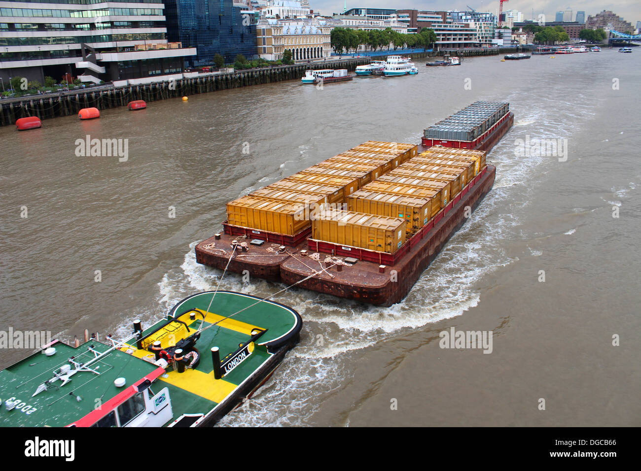 Cargo transport boat on The River Thames Stock Photo - Alamy