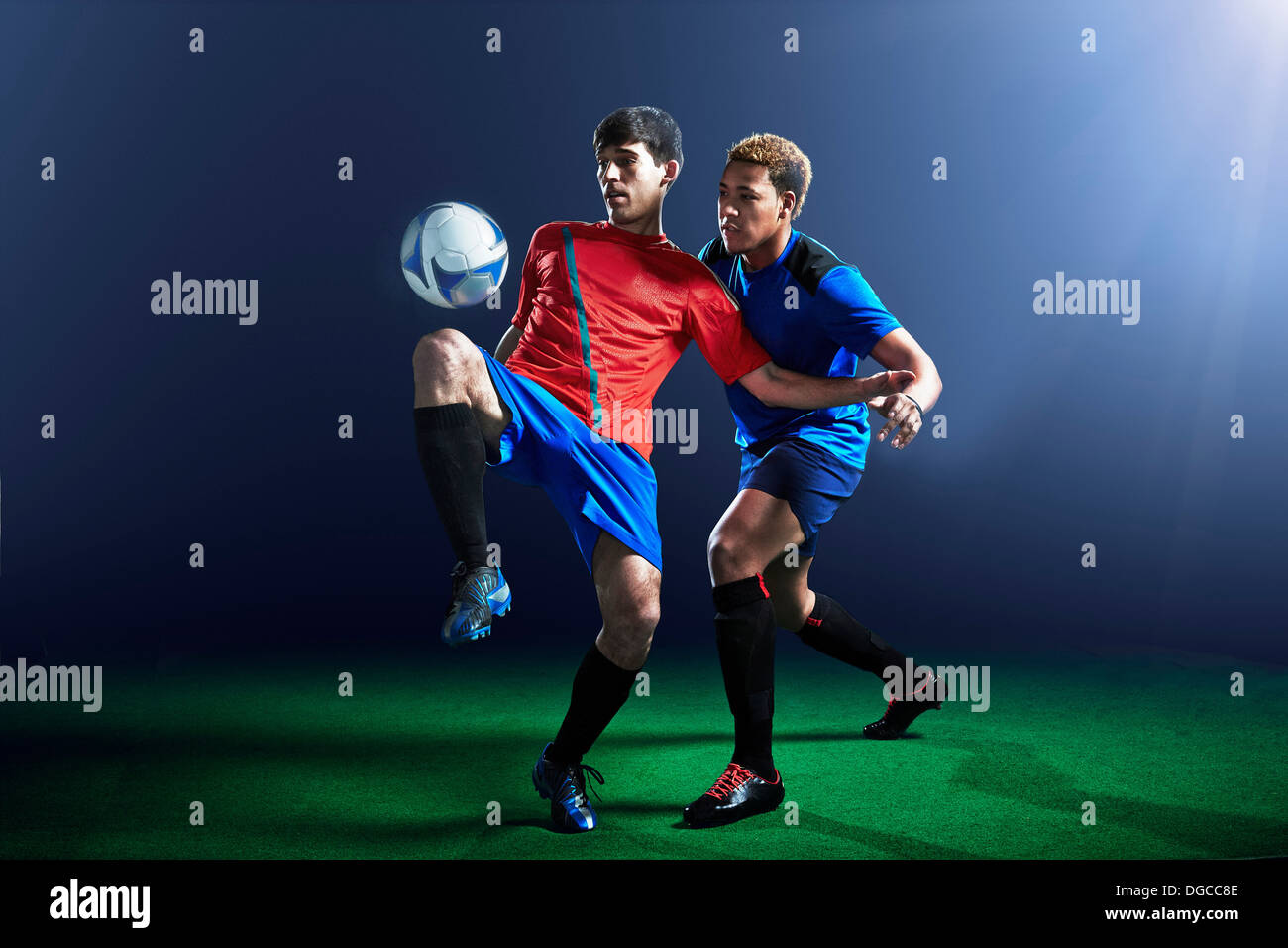 Soccer Player Dribbling Ball Stock Photos & Soccer Player Dribbling ...