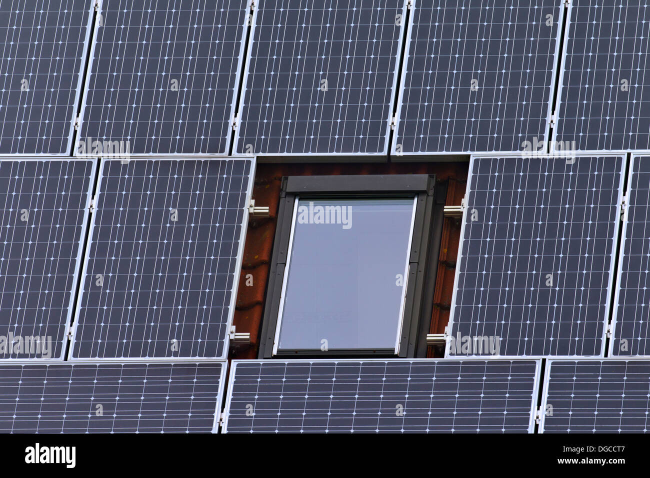 Close-up of photovoltaic solar panels on roof of house for ecological ...