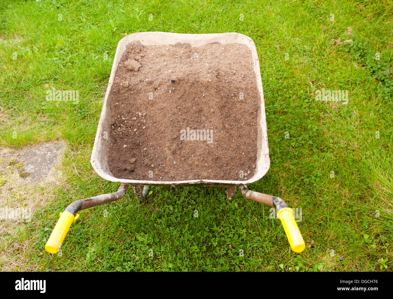 Wheel barrow full of earth hi-res stock photography and images - Alamy