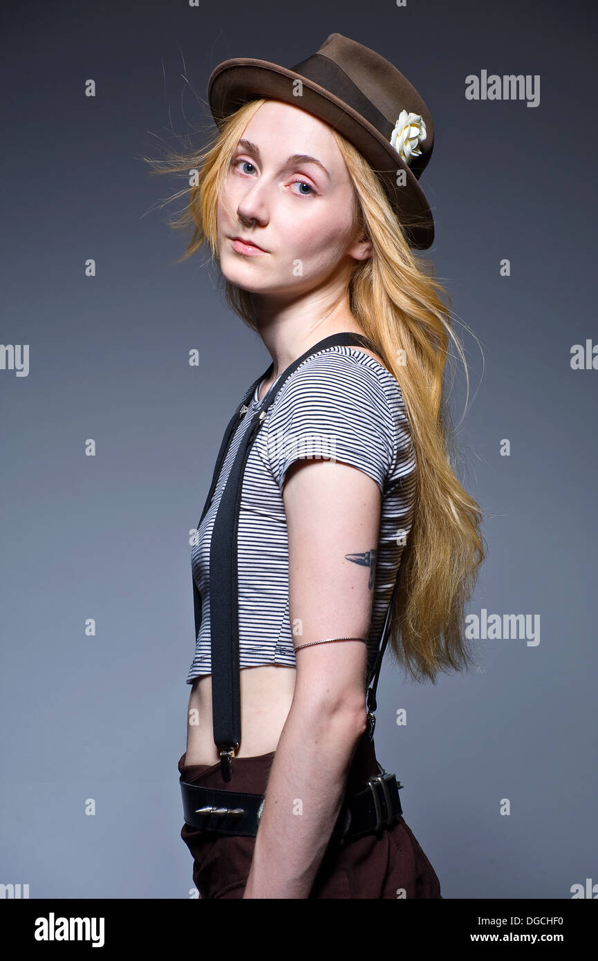 Mid adult woman wearing hat in studio hi-res stock photography and ...