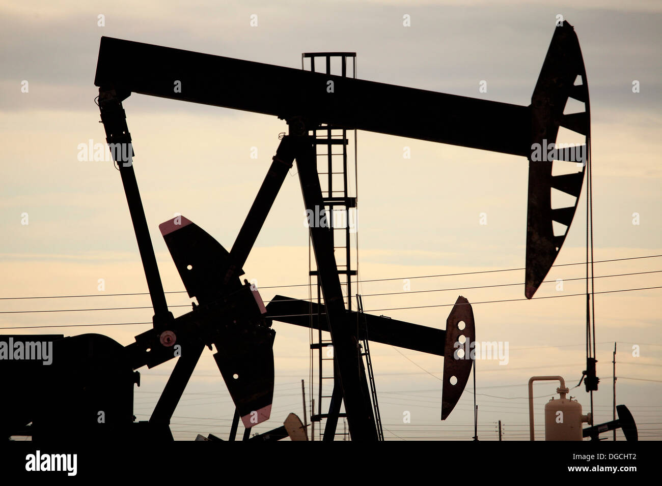 Derricks in oil well, California Stock Photo - Alamy