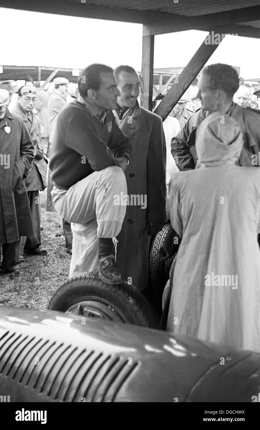 Harry Schell and Baron de Graffenried chatting in the paddock at ...