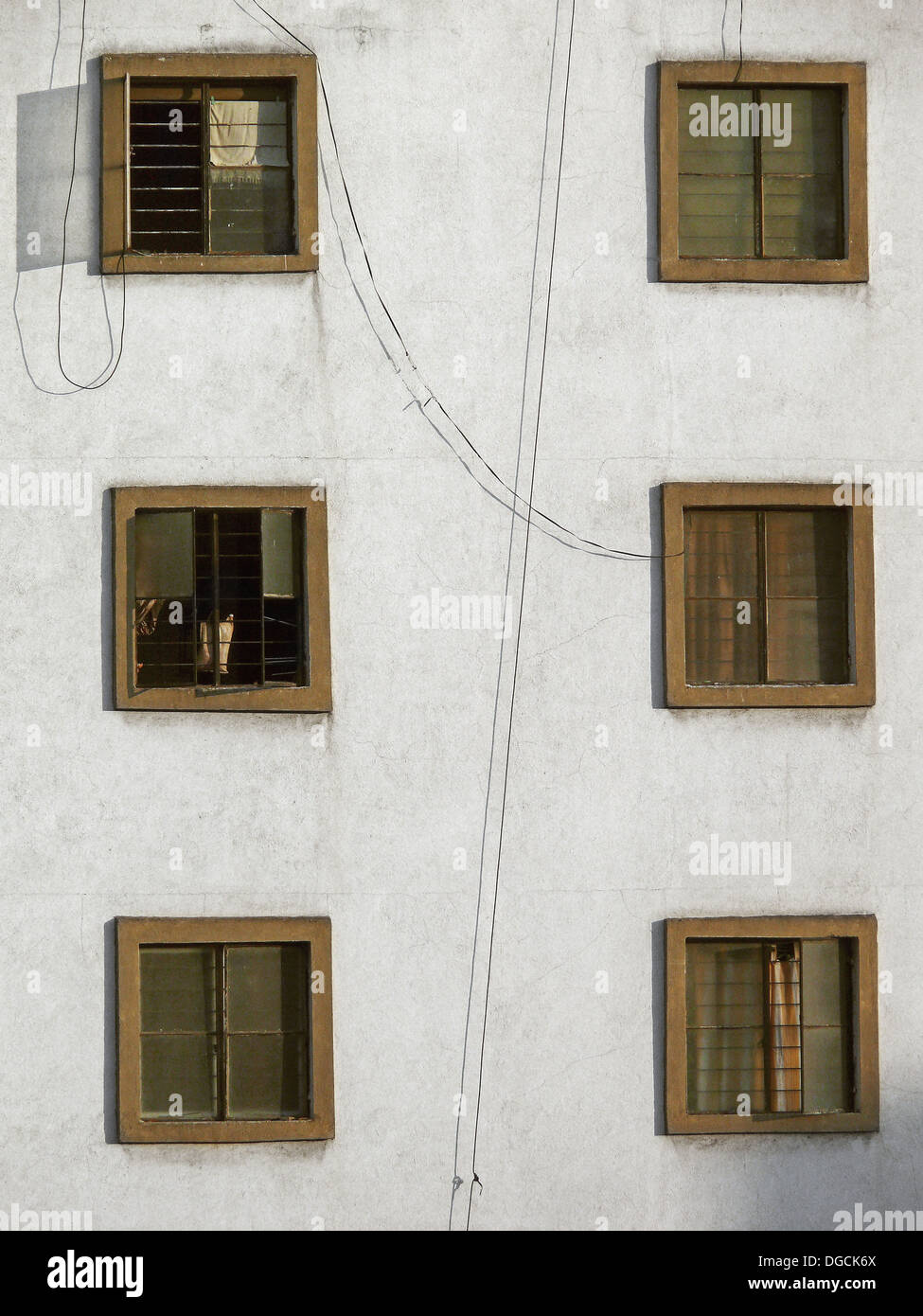 Close up of a residential building with six windows. Pune, Maharashrea ...