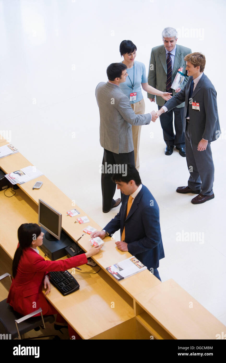 Man woman shake hands reception hi-res stock photography and images - Alamy