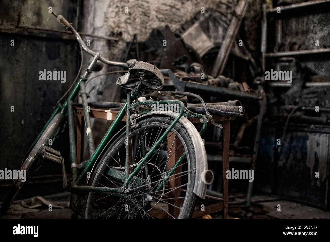 Bicycle in a dirty garage Stock Photo - Alamy