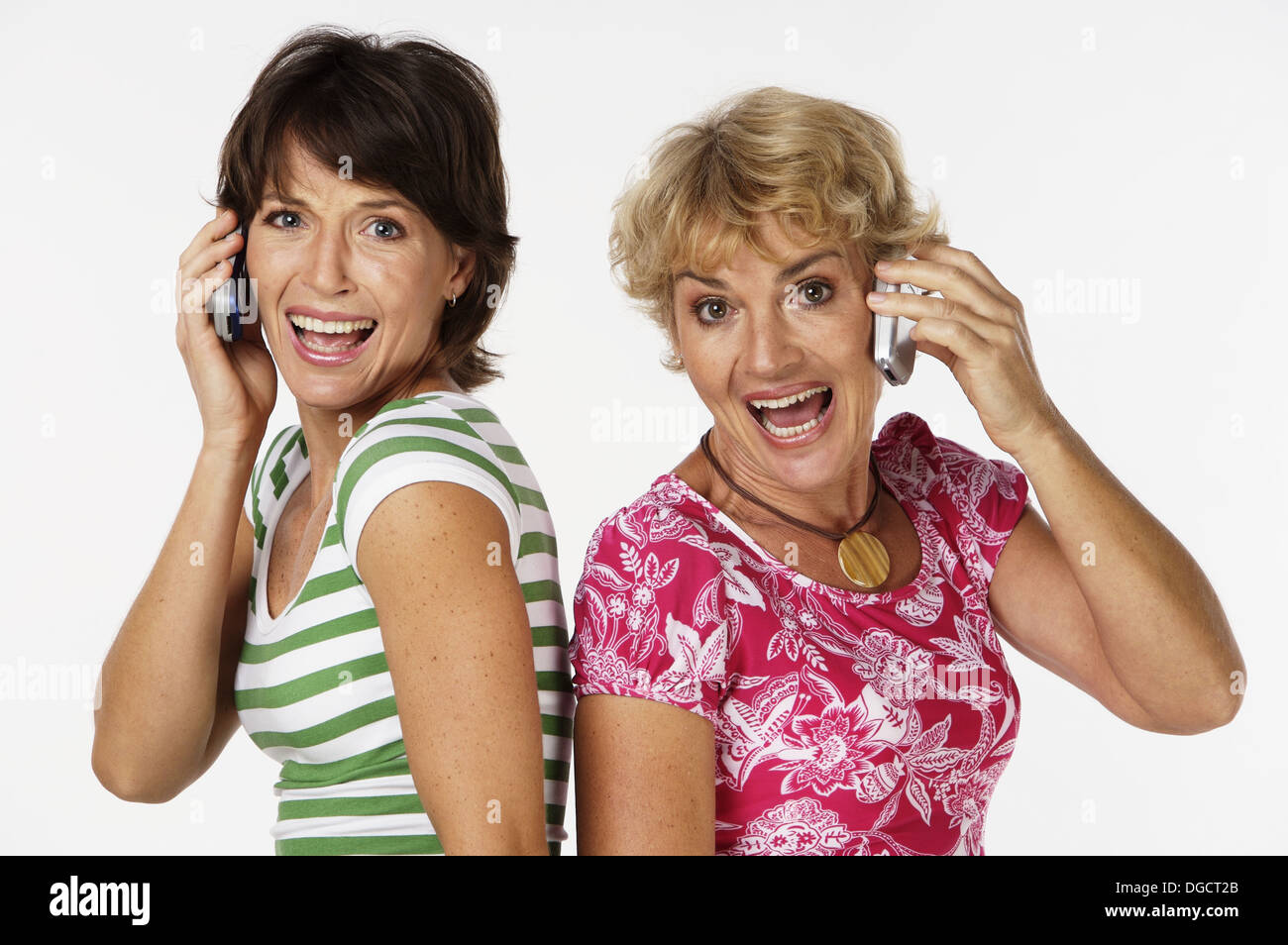 Mother and daughter talk on the phone in a studio setting Stock Photo ...