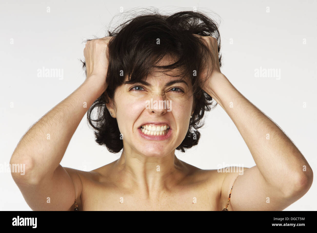 Young woman hands grabbing head hi-res stock photography and images - Alamy