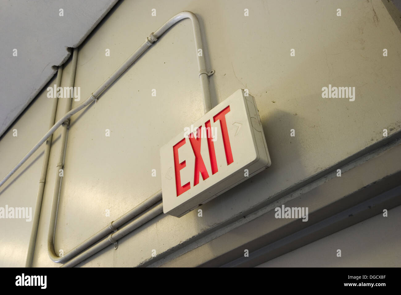 ´EXIT´ sign next to electrical cables Stock Photo - Alamy