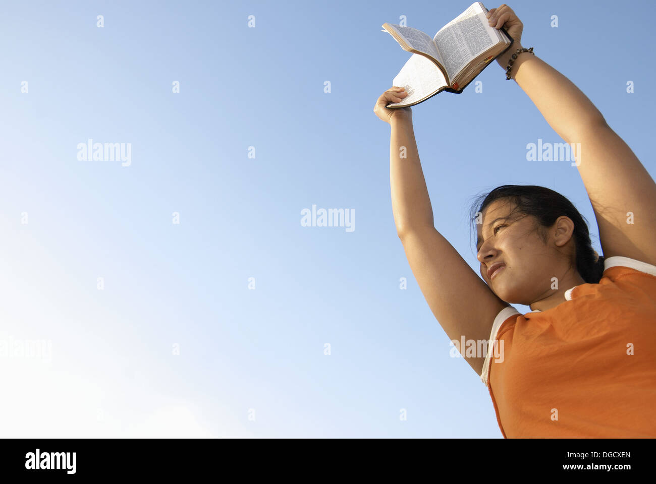 Woman holding bible hi-res stock photography and images - Alamy