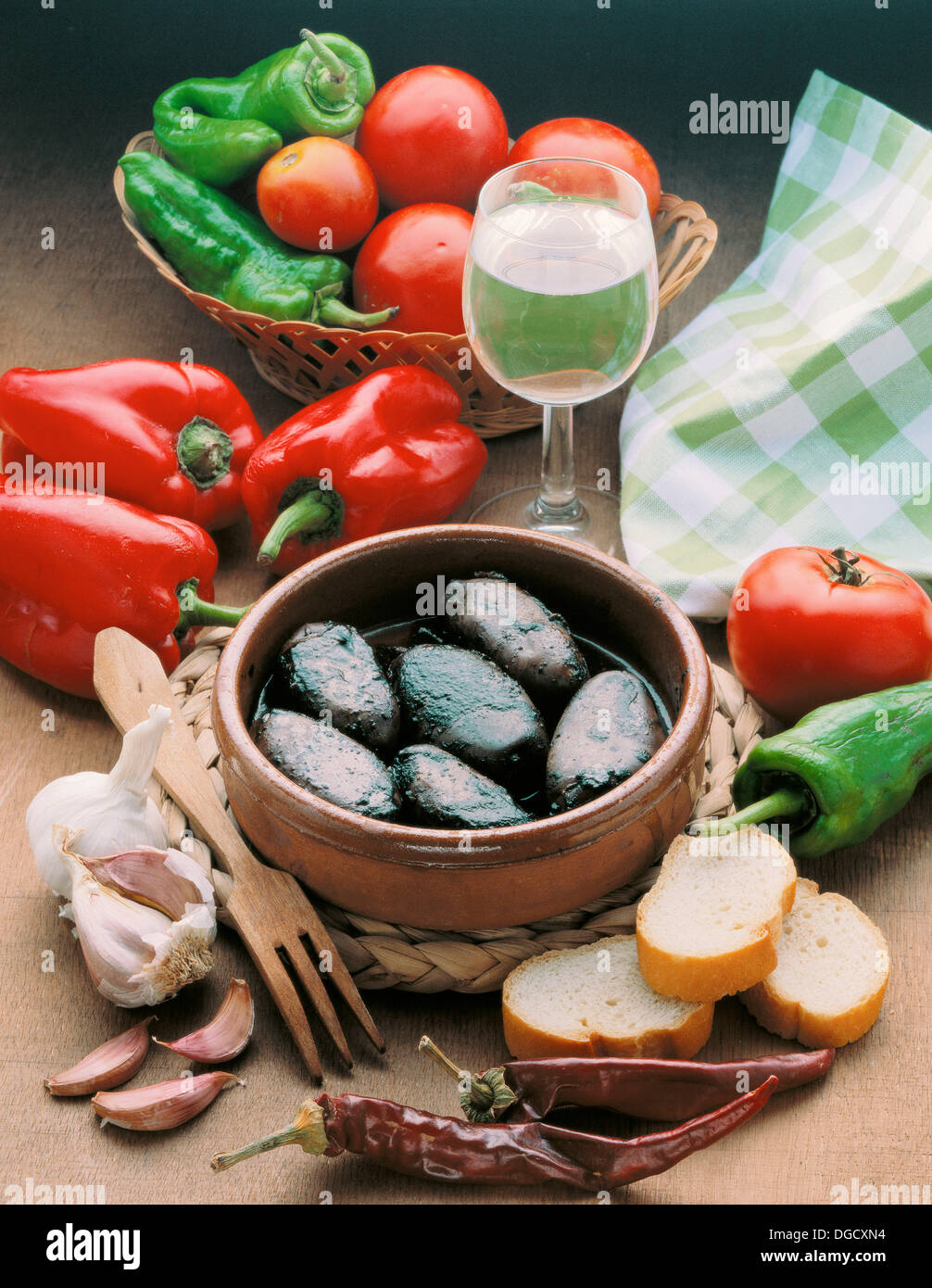 Baby squids in their ink, Basque cuisine Stock Photo - Alamy