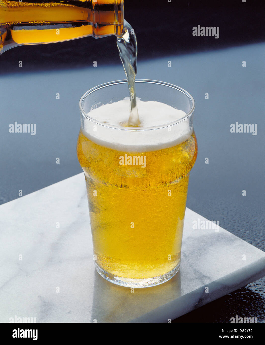Frothing beer bottle hi-res stock photography and images - Alamy