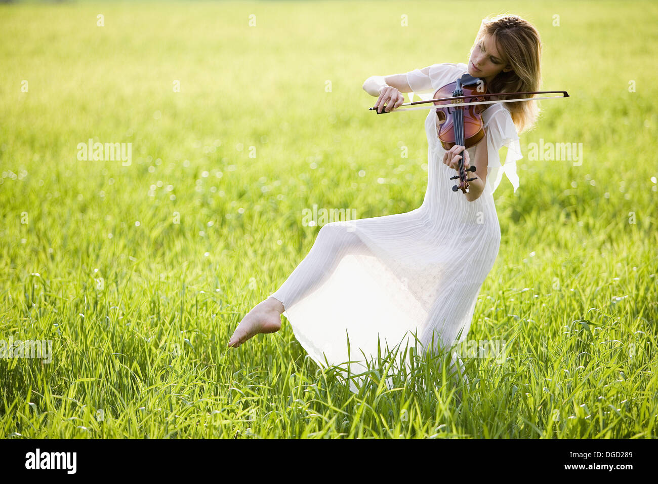 Playing violin foot hi-res stock photography and images - Alamy
