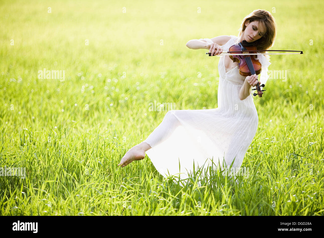 Playing violin foot hi-res stock photography and images - Alamy