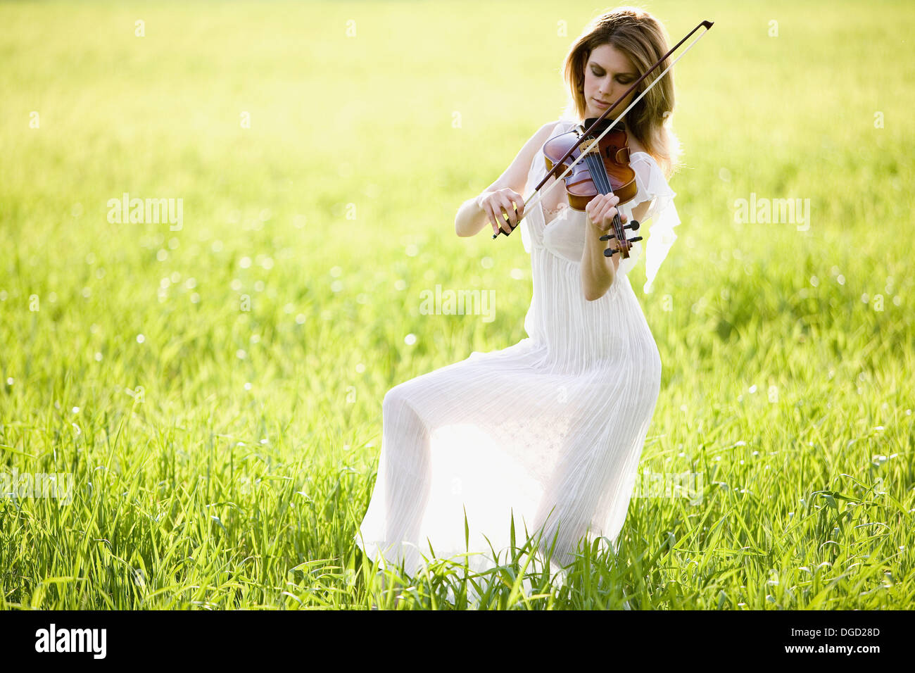 Playing violin foot hi-res stock photography and images - Alamy