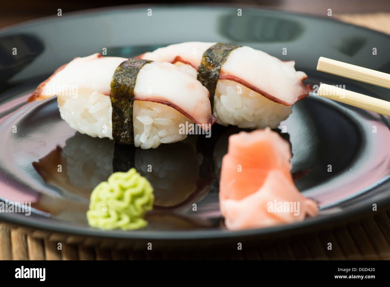 Sushi in sushi bar. Table and ration sushi Stock Photo - Alamy