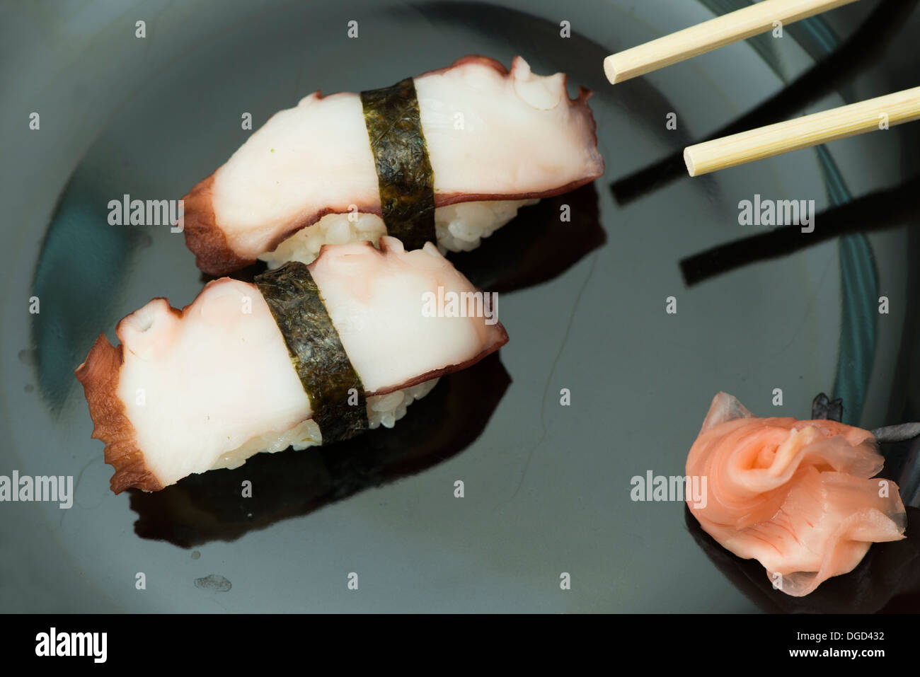 Sushi in sushi bar. Table and ration sushi Stock Photo - Alamy