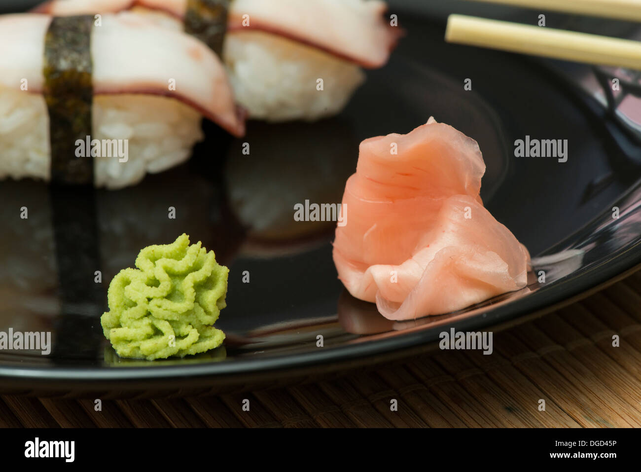 Sushi in sushi bar. Table and ration sushi Stock Photo - Alamy