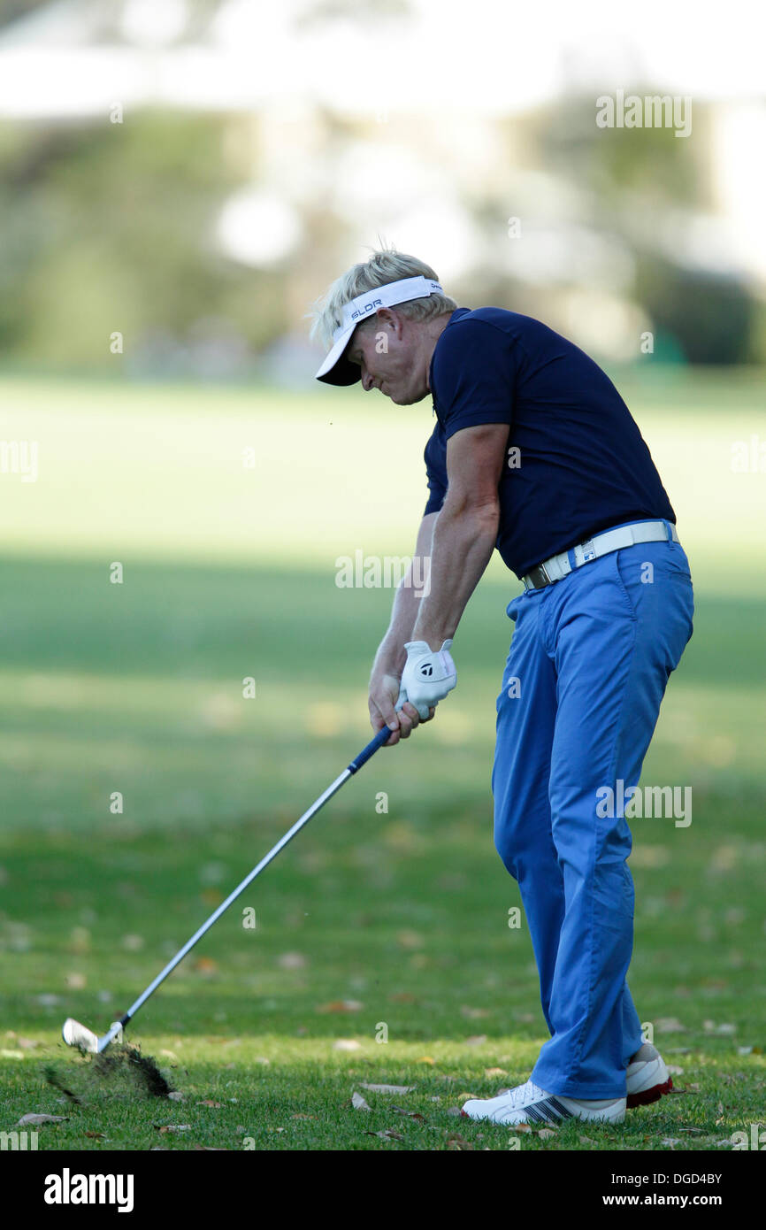 Perth, Australia. 18th Oct, 2013. Peter Hedblom (SWE) plays an approach ...