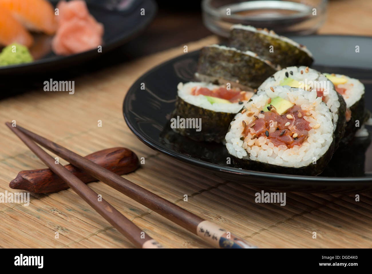 Sushi in sushi bar. Table and ration sushi Stock Photo - Alamy