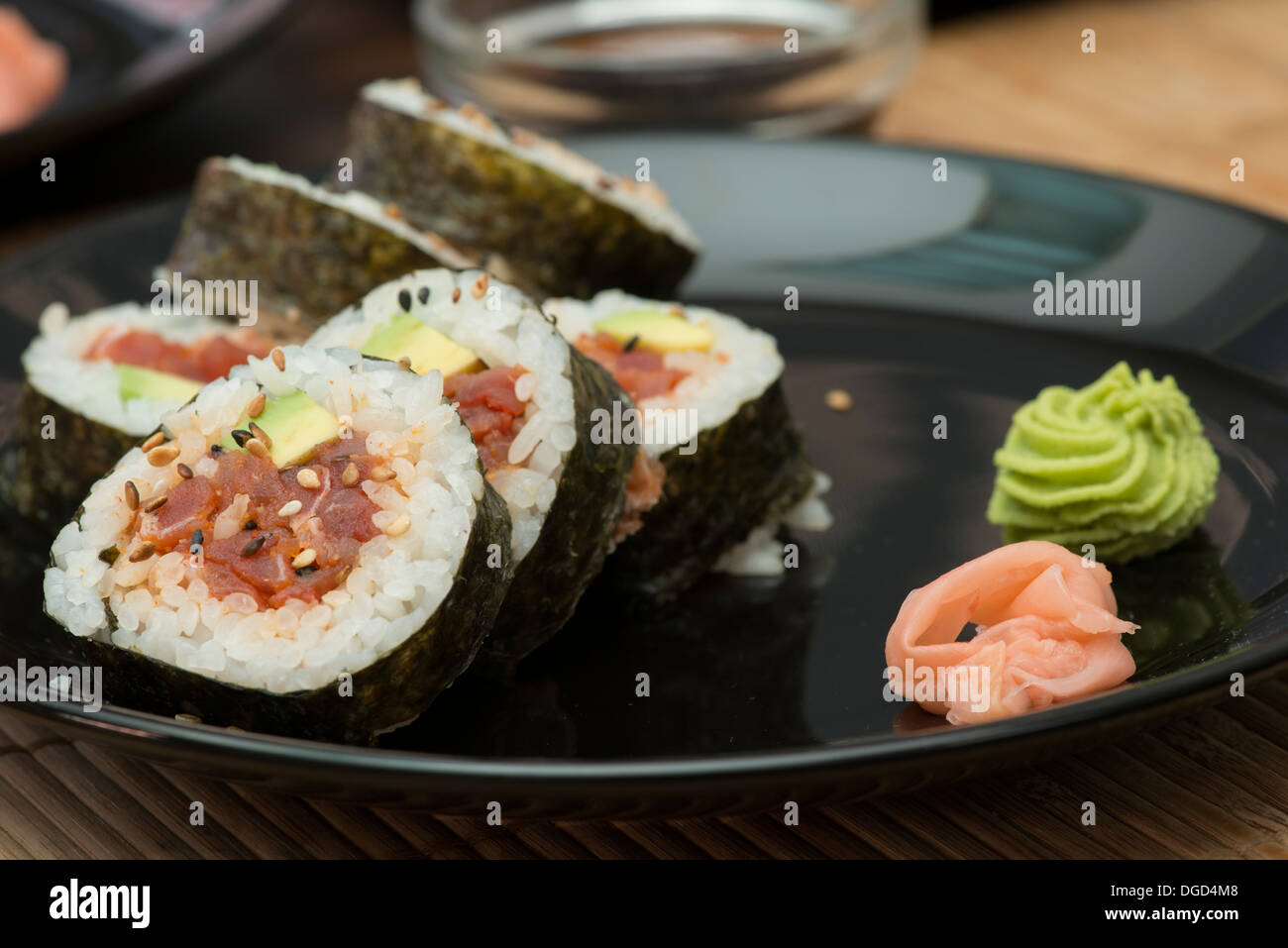 Sushi in sushi bar. Table and ration sushi Stock Photo - Alamy