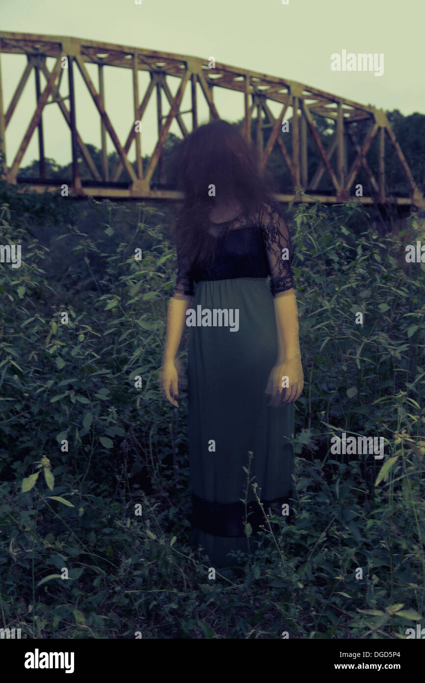 Creepy image woman standing in hi-res stock photography and images - Alamy