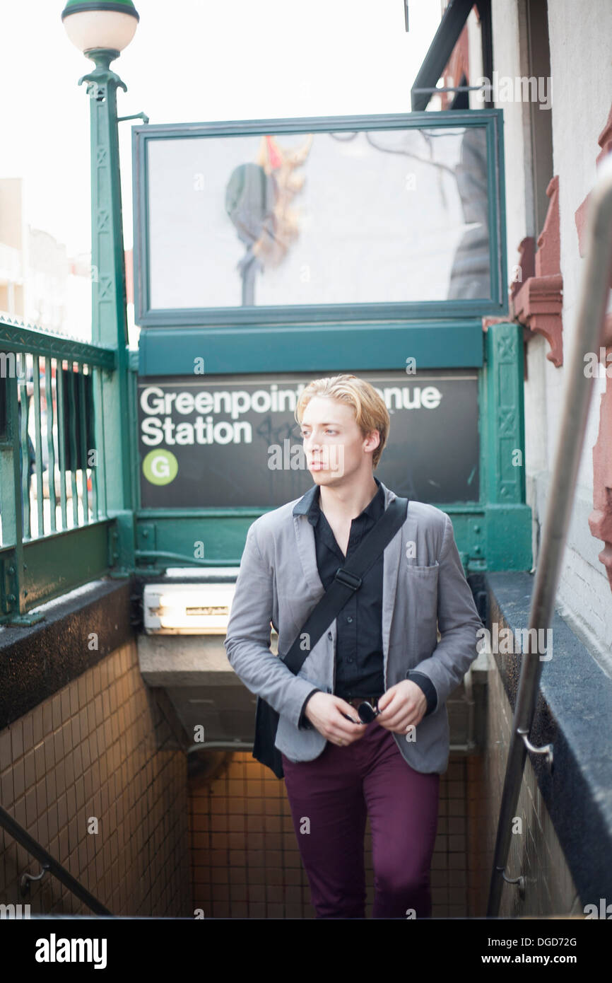 Young man emerging from subway station Brooklyn, New York City, USA ...