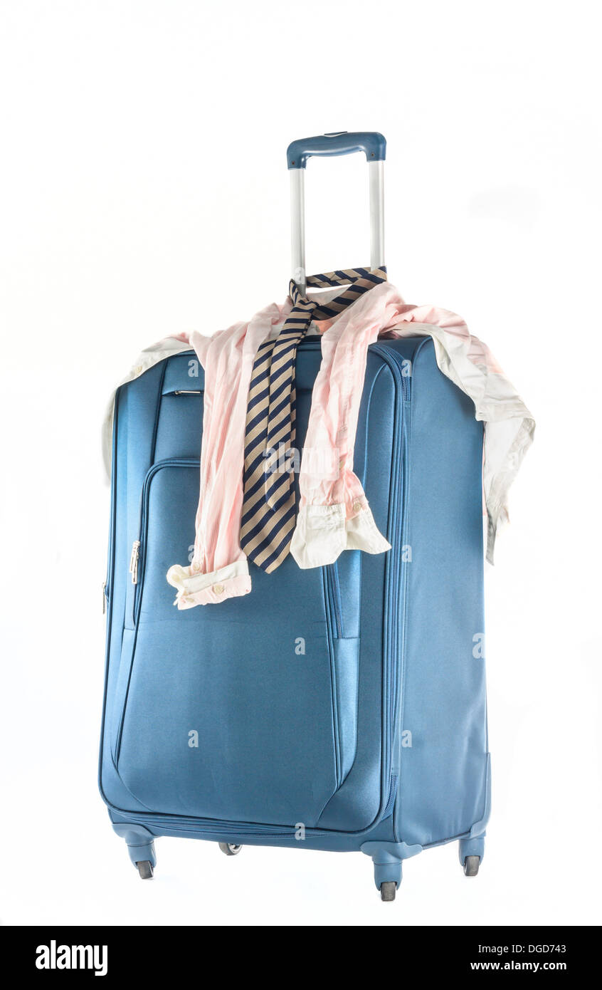 suitcase with clothing isolated on white Stock Photo - Alamy