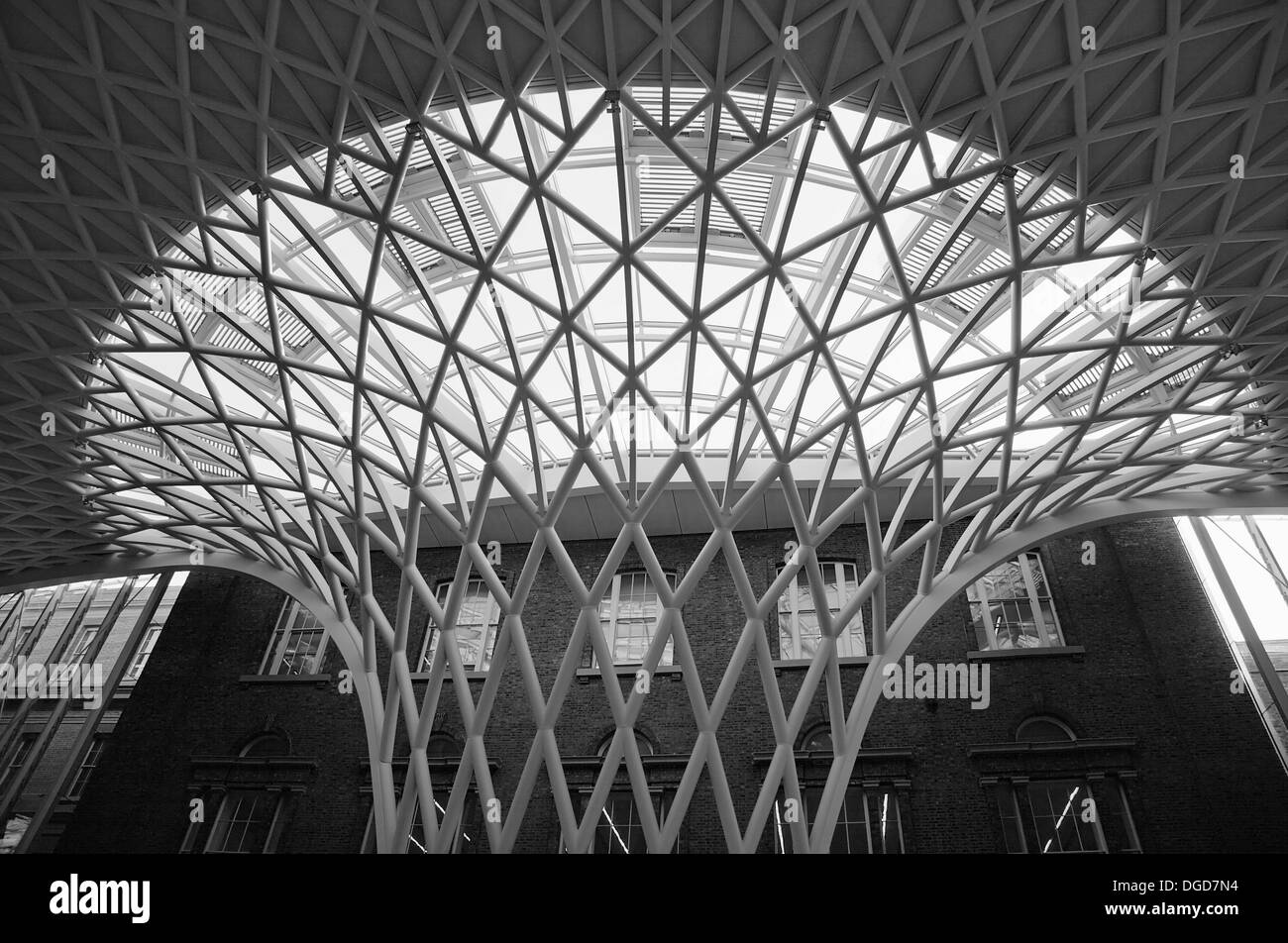 England, London, B&W shot of the metal structure inside Kings Cross ...