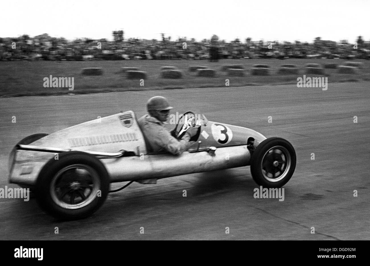 Eric Brandon in a Cooper in a 500cc F3 supporting race at the British ...
