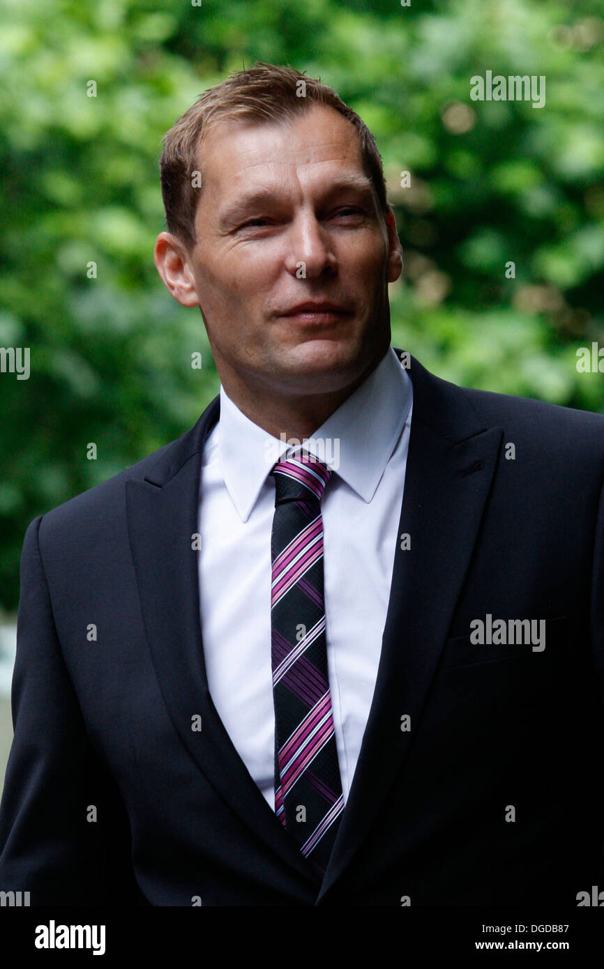 PC Simon Harwood arrives at Southwark Crown Court with his wife Helen ...