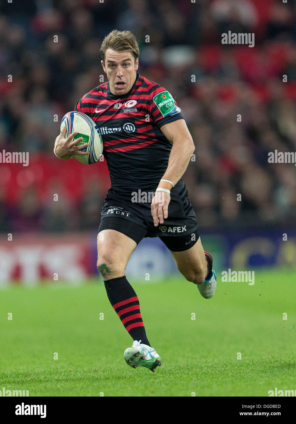 London, UK. 18th Oct, 2013. Chris WYLES of Saracens bursts clear on the ...