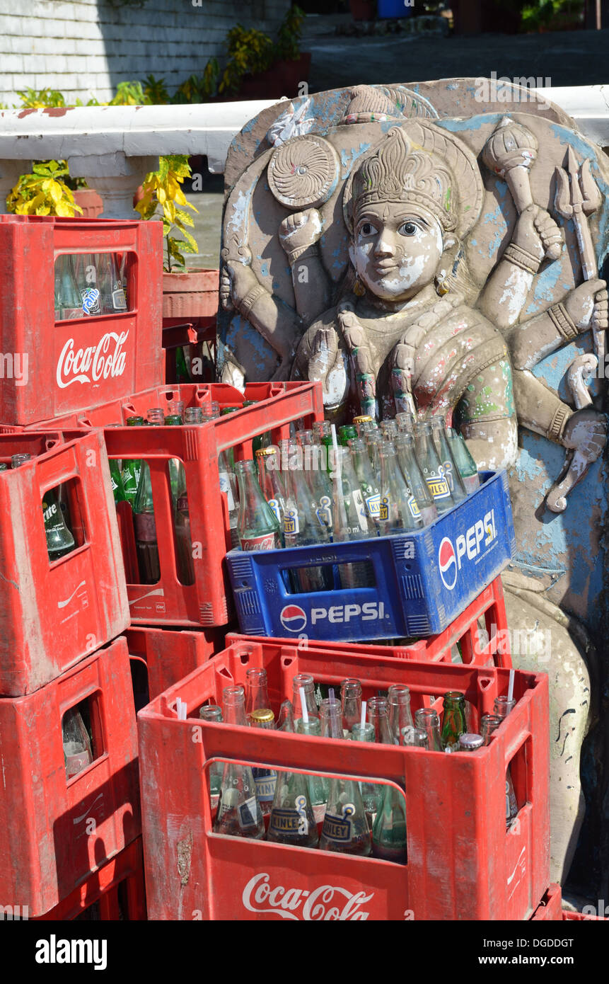 Empty glass bottles and Hindu god sculpture, Rishikesh, India Stock ...