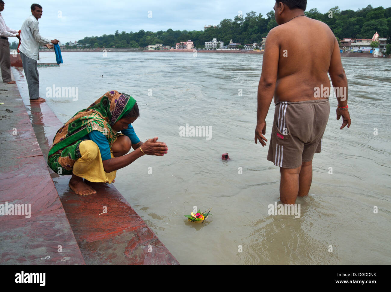 Morning prayers and bathers in the Ganges River, Rishikesh, India Stock ...
