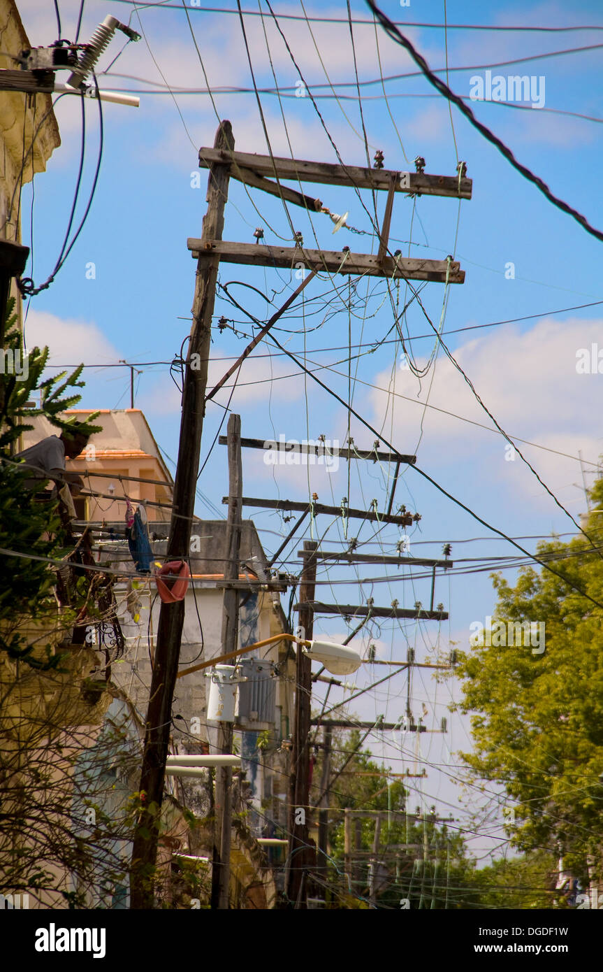 Olds Wooden Electrical Posts over a Cloudy Sky Background Stock Photo ...