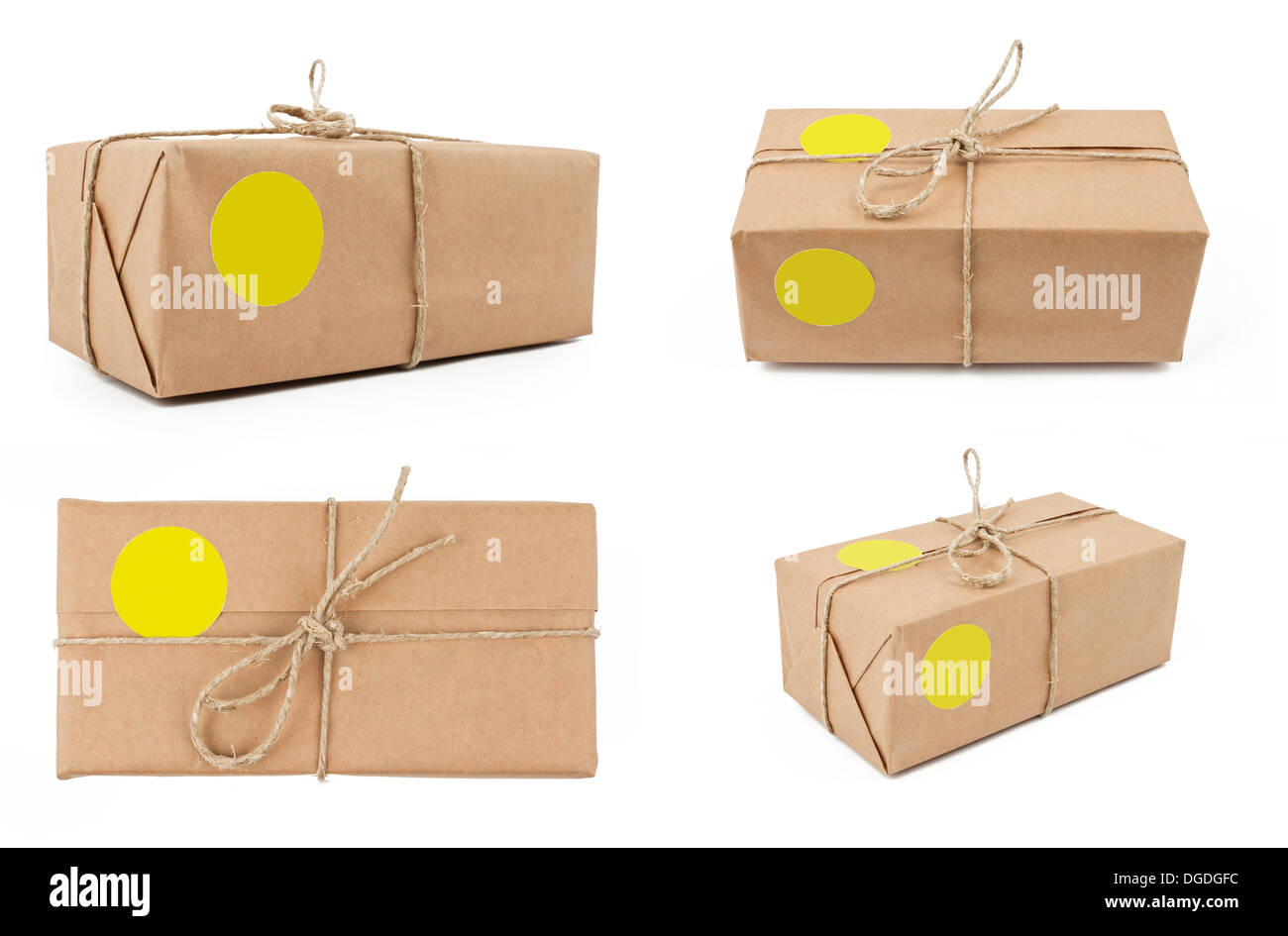 Brown wrapped parcel with yellow label Stock Photo - Alamy