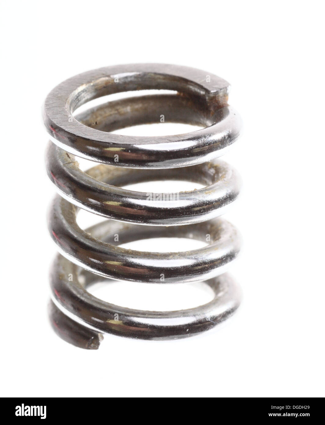 Metal steel industrial coil spring isolated on white Stock Photo - Alamy