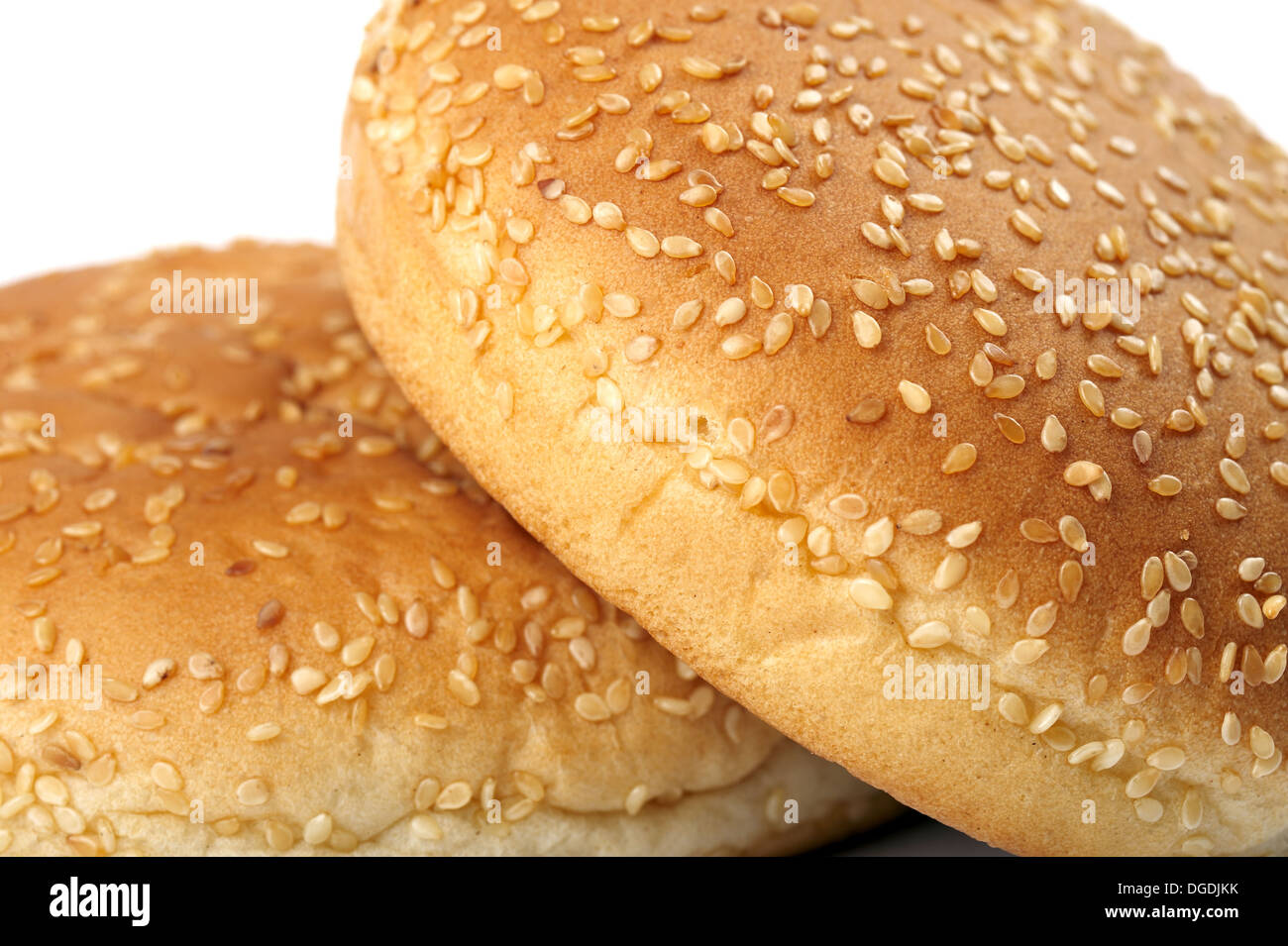 Closeup of two appetizing fresh burger buns on white background Stock ...