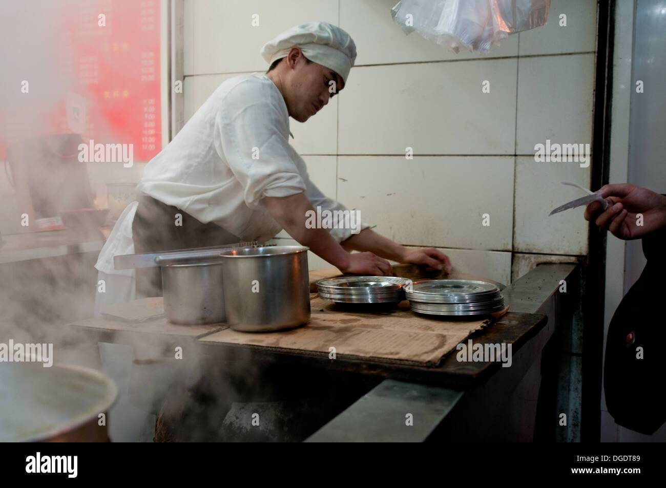 cook in restaurant in Shanghai, China Stock Photo - Alamy