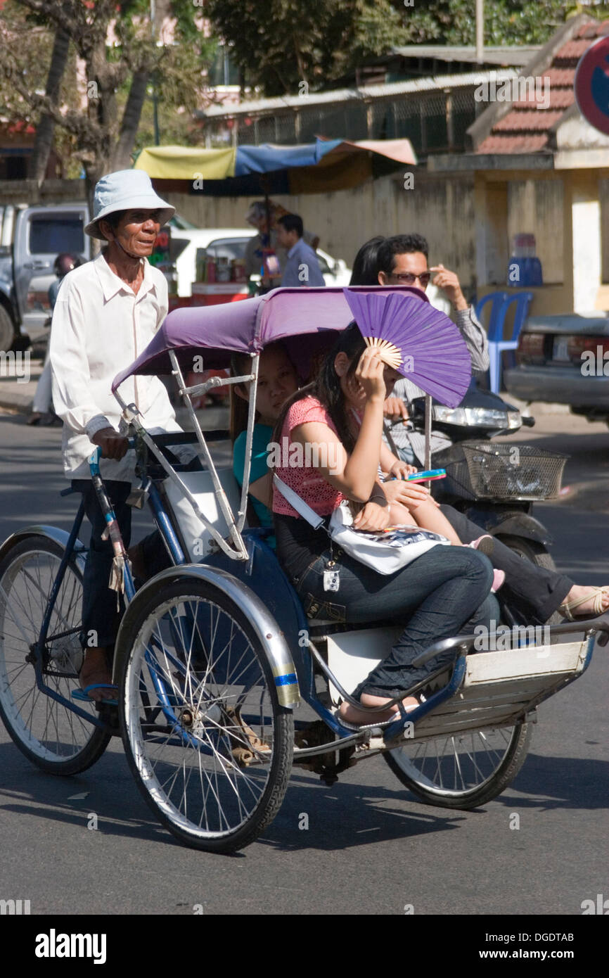 Man peddling cyclo hi-res stock photography and images - Alamy