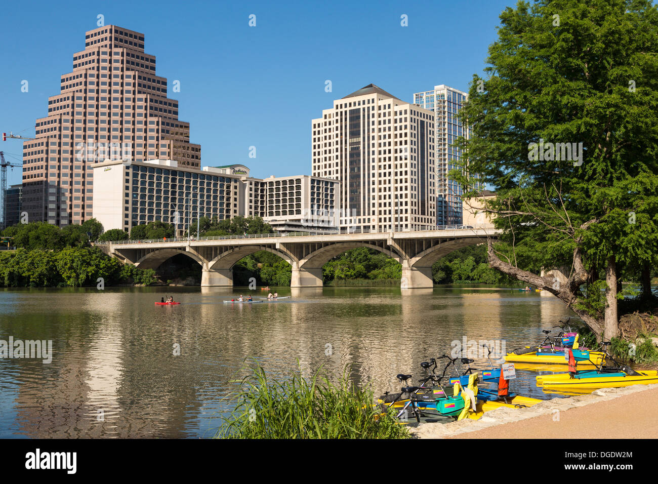 People enjoy paddling on Lady Bird Lake Austin skyline Texas USA Stock ...
