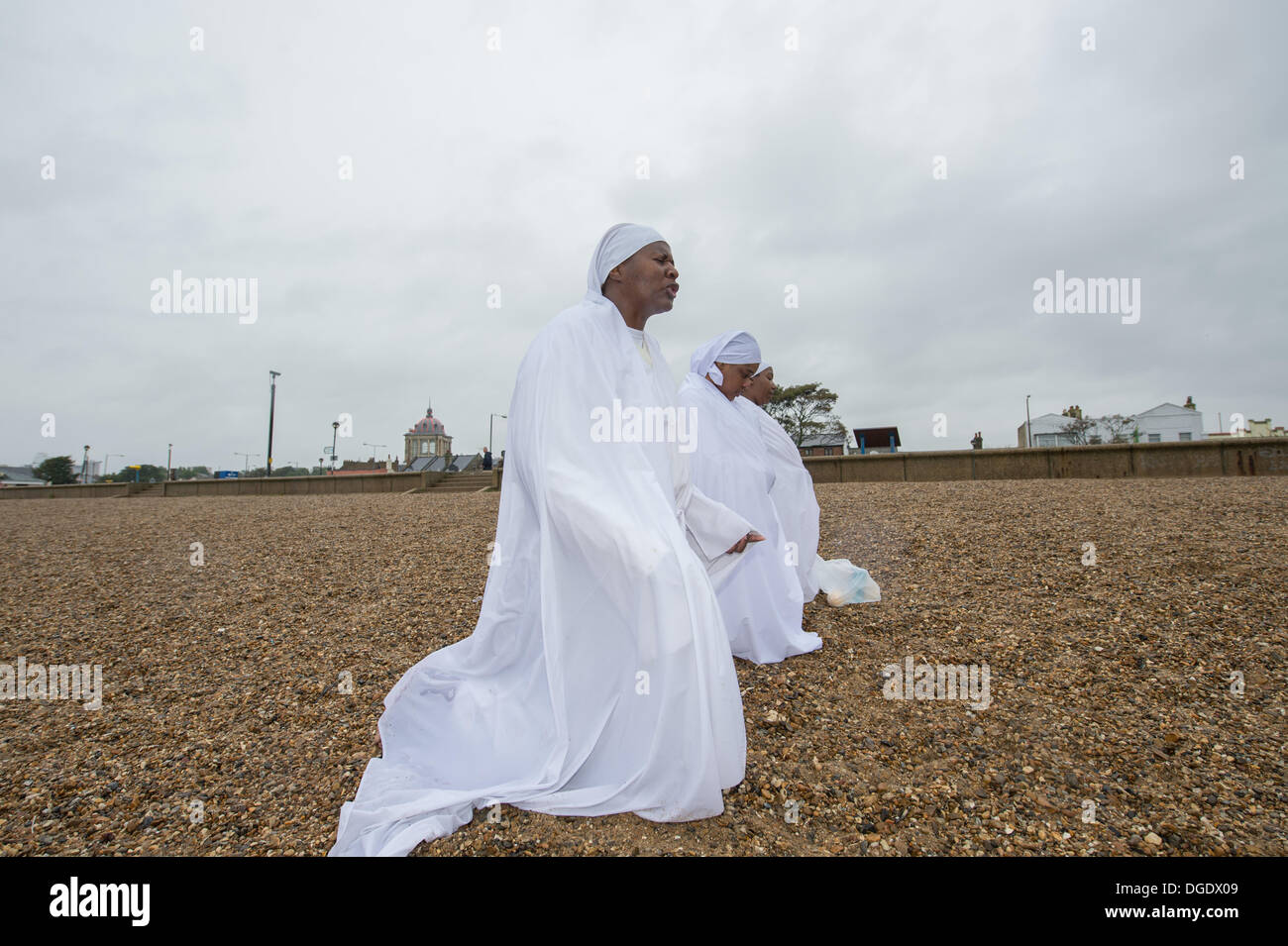Praying on the beach hi-res stock photography and images - Alamy