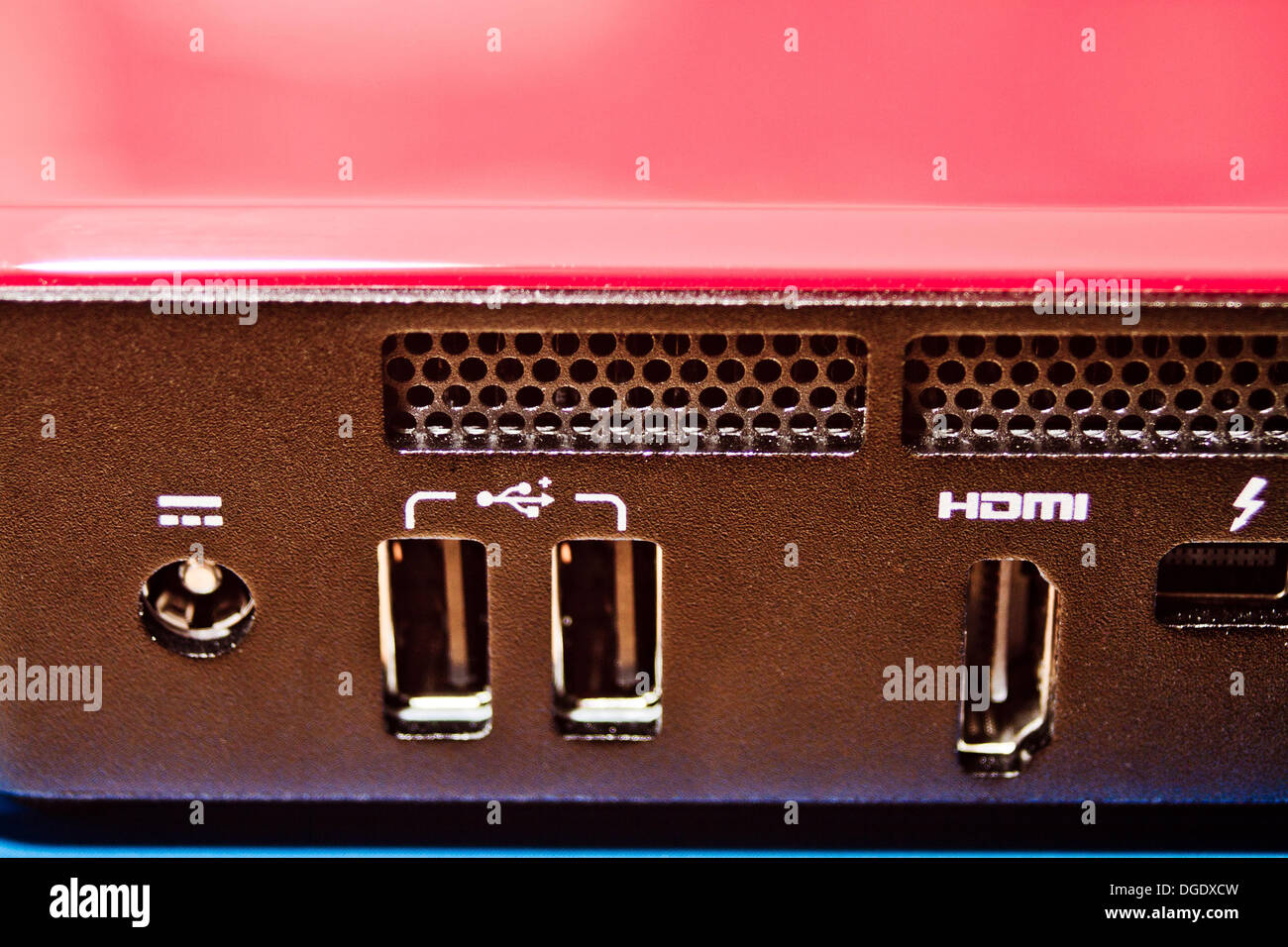 Close-up photograph of the rear connections on a modern mini desktop ...