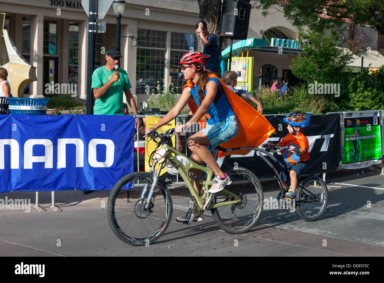 Cyclist in fancy dress taking part in the annual Charity cycle race ...