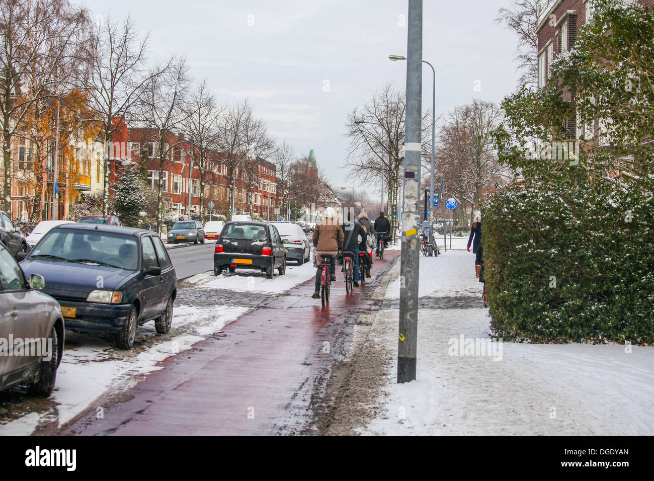 People biking home in Dutch winter Stock Photo - Alamy