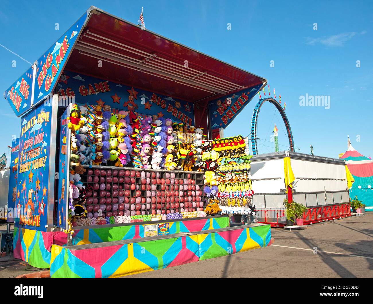balloon game on a fair midway Stock Photo - Alamy