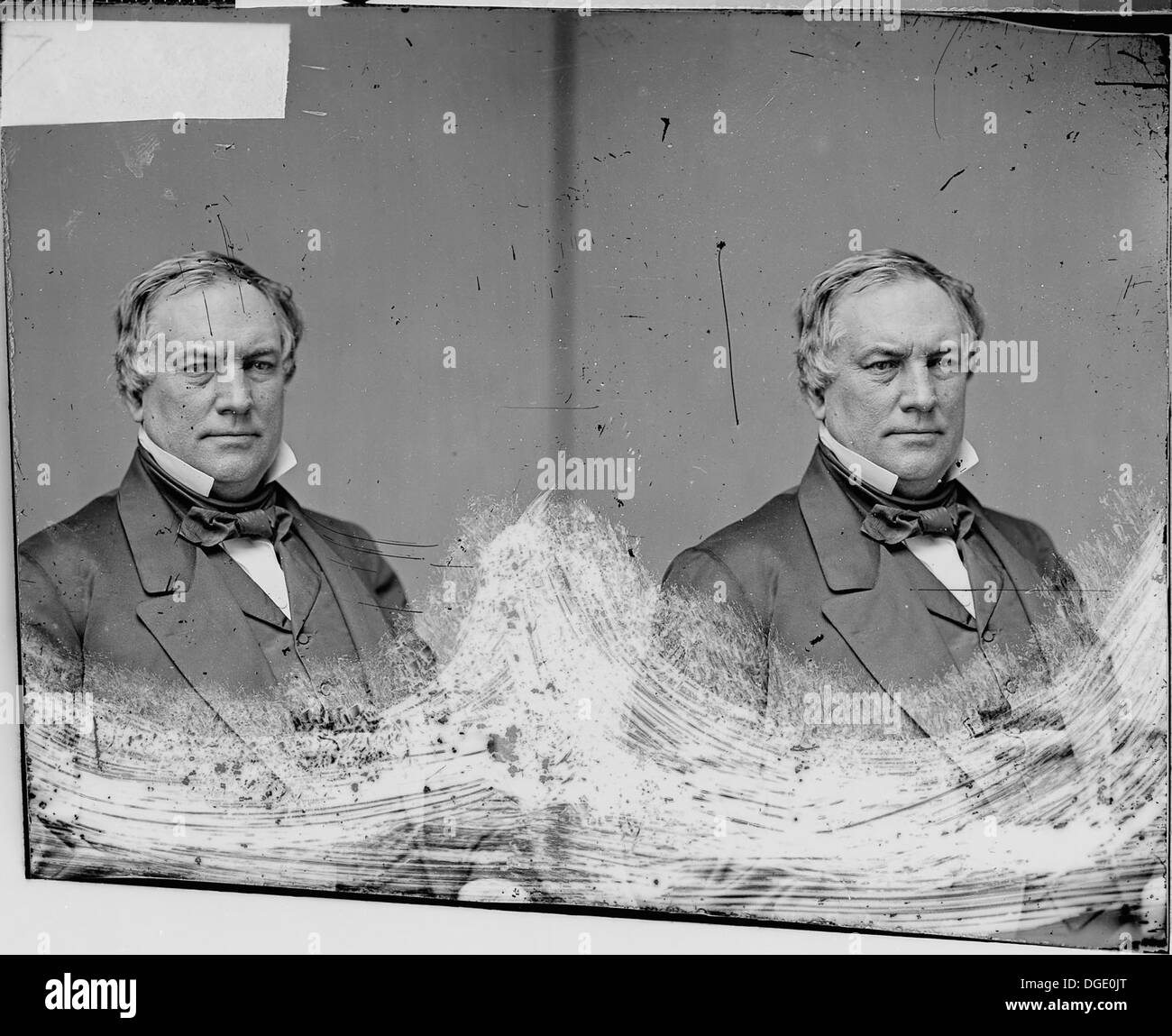 This image features a distinguished gentleman, captured in a formal ...