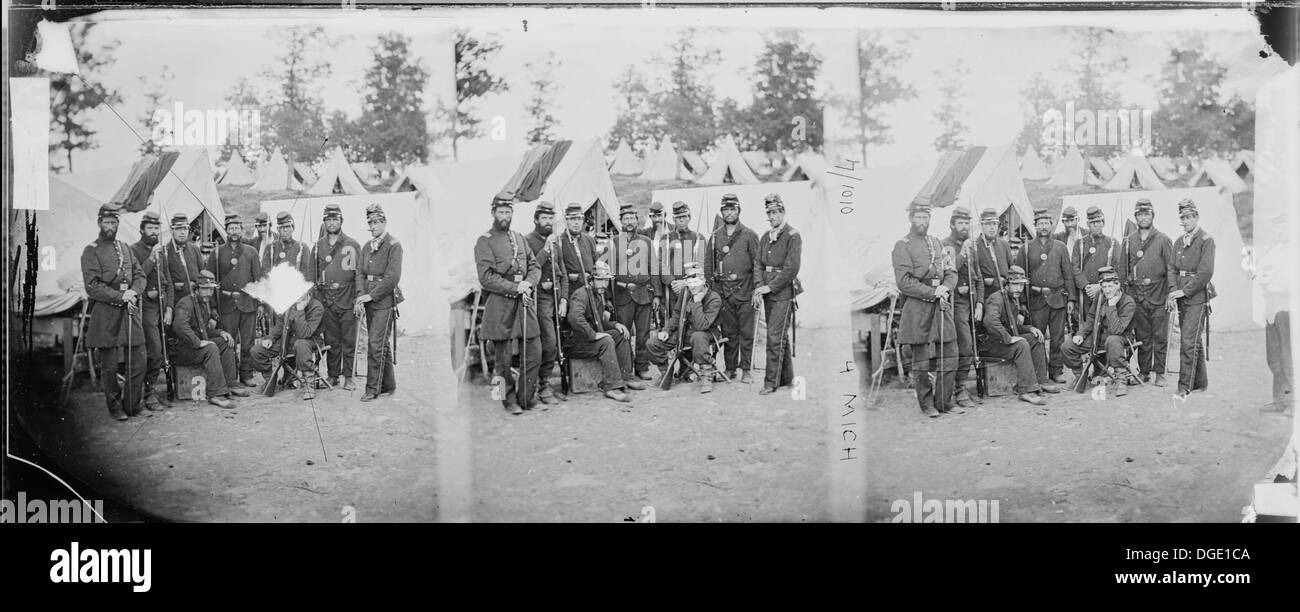 A historical photograph depicting a group of soldiers from Company D ...
