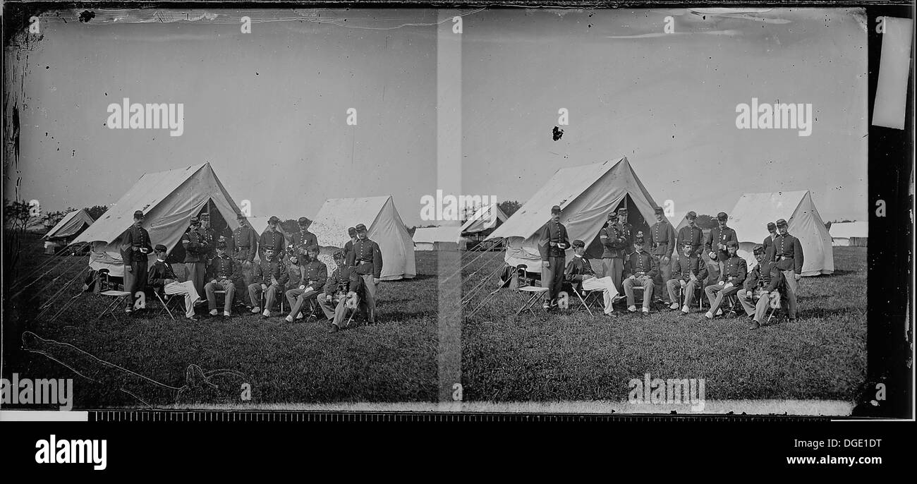 A group of infantry soldiers poses for a photograph, representing ...