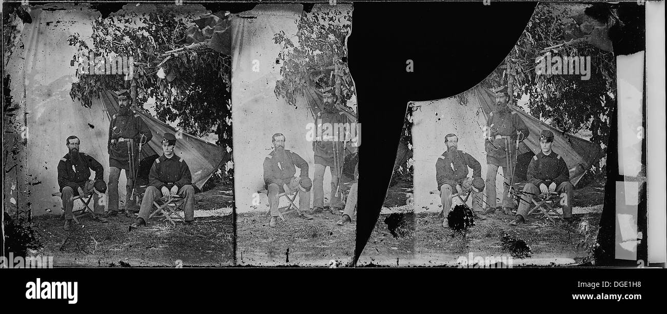 A group of military officers is captured in a photograph, likely during ...